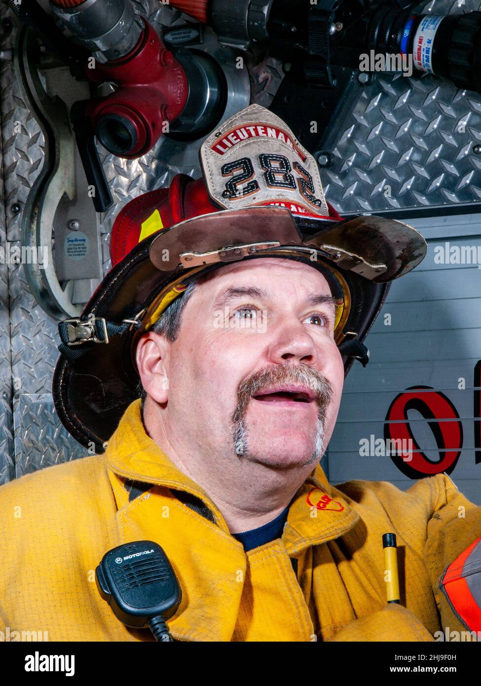 Firefighter in turnout gear Stock Photo - Alamy