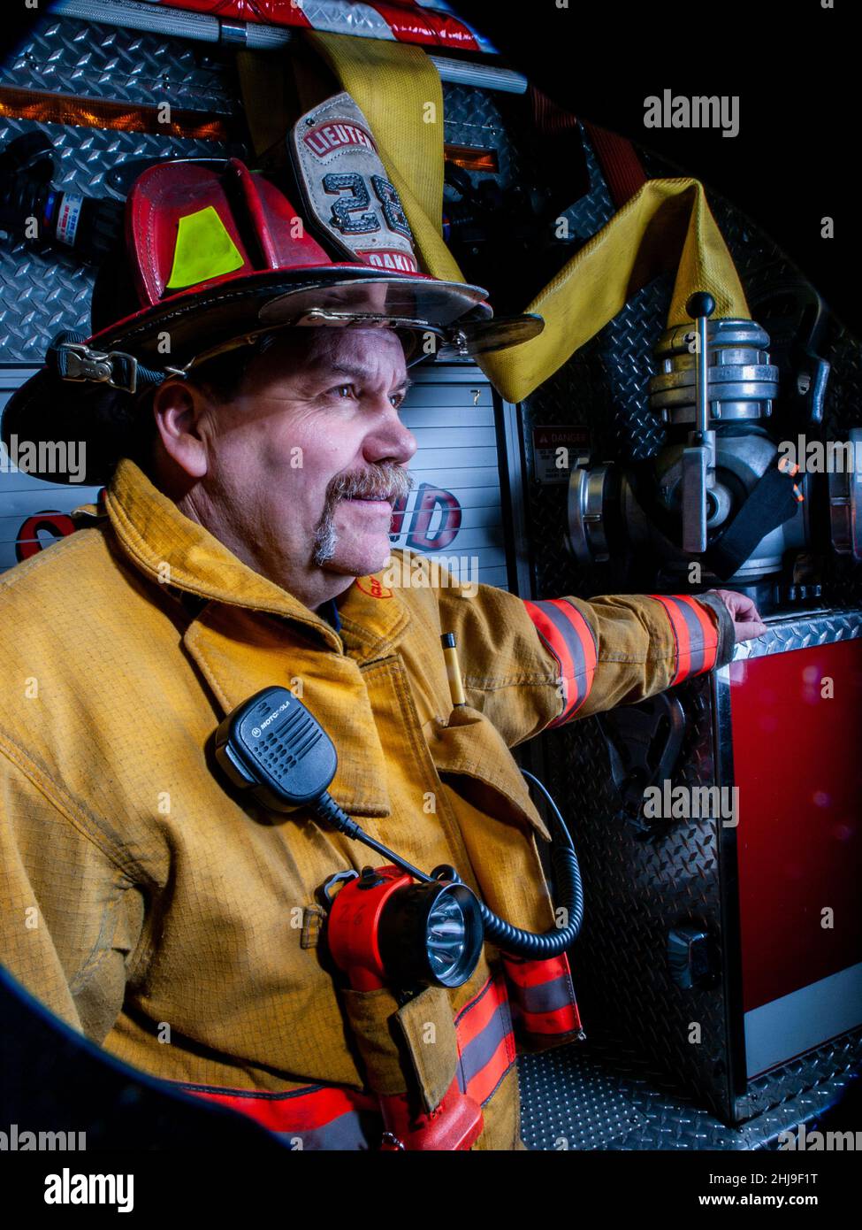 Firefighter in turnout gear Stock Photo - Alamy