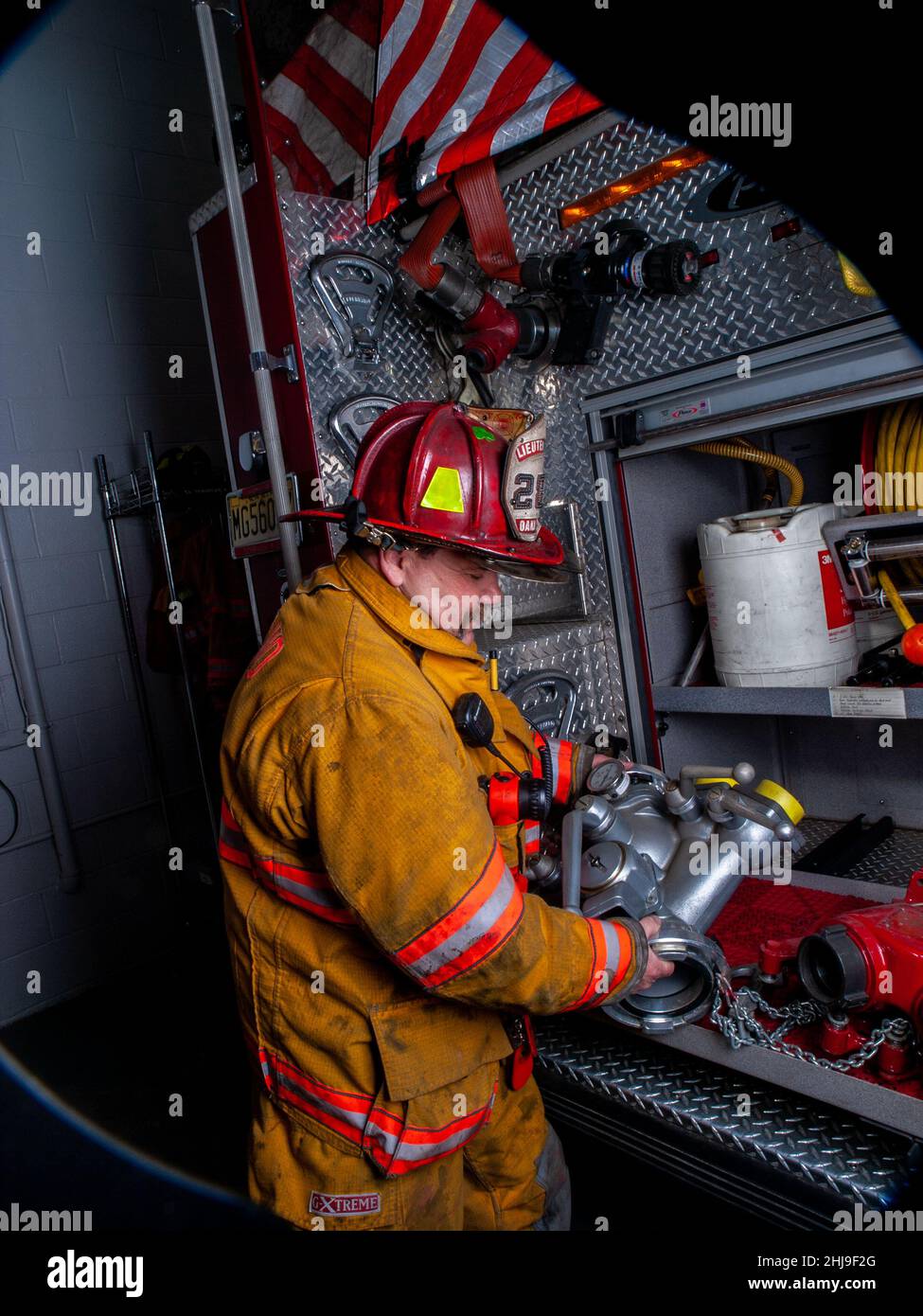 Firefighter in turnout gear Stock Photo - Alamy