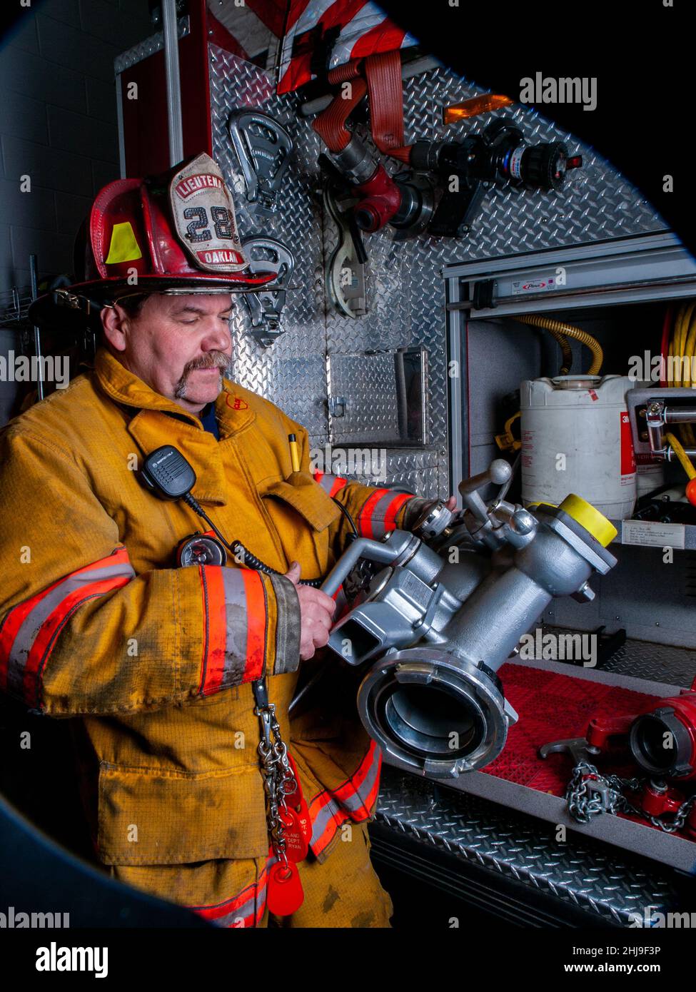 Firefighter in turnout gear Stock Photo - Alamy