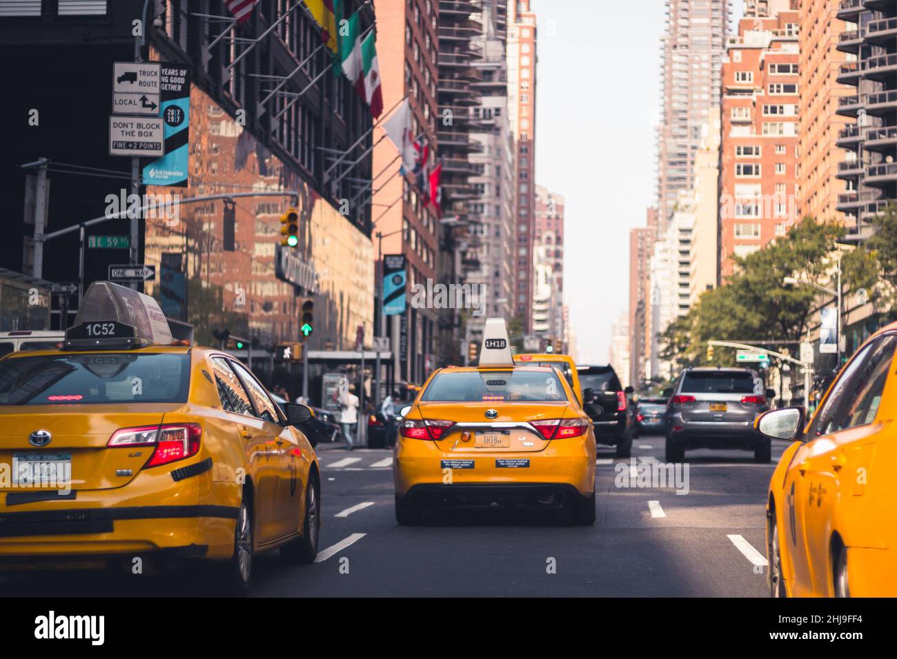 Bustling city traffic Stock Photo - Alamy
