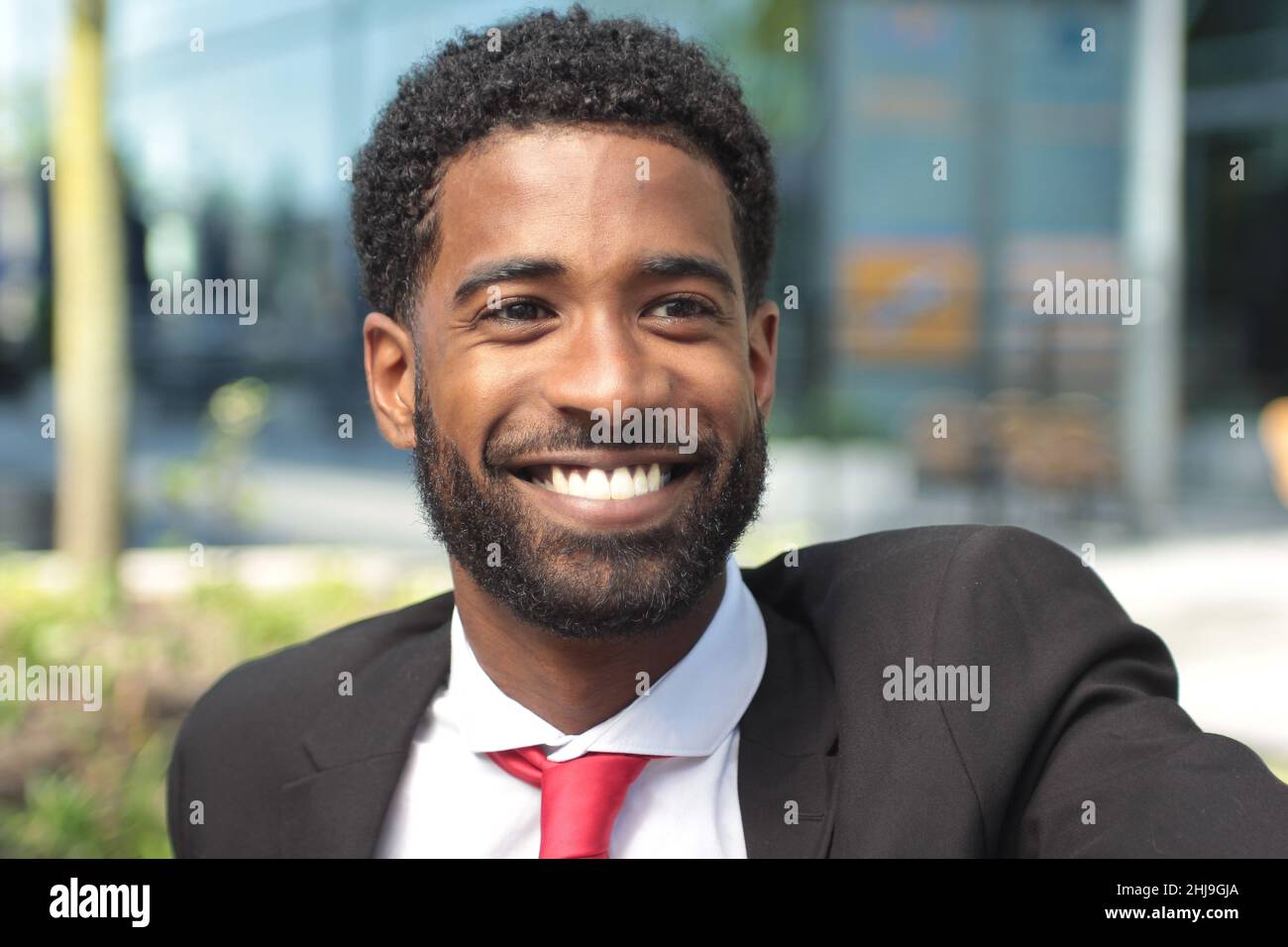 Beautiful businessman outside in the summer Stock Photo - Alamy