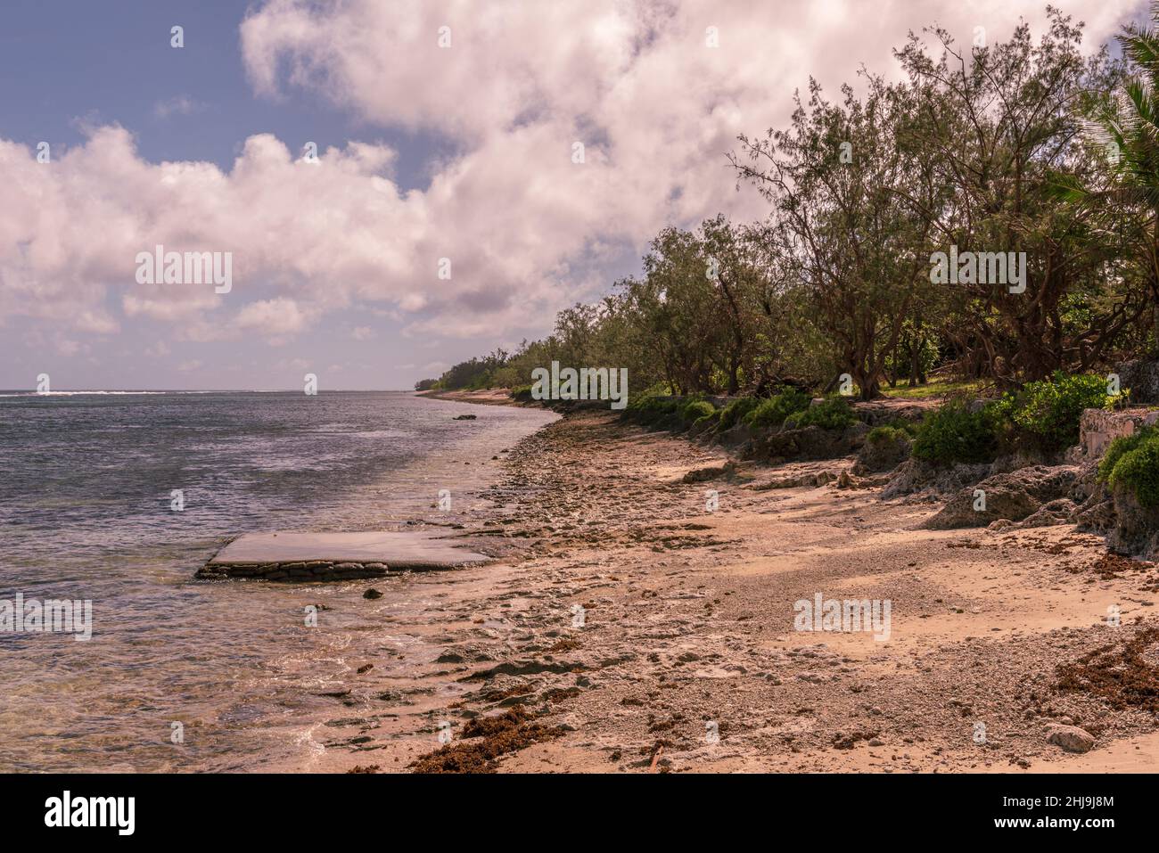 Wide angle photo of a slightly muddy beach in Tonga Stock Photo - Alamy