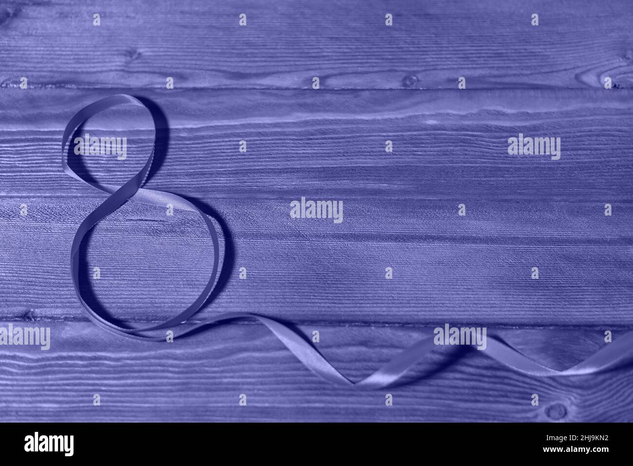 March 8th. International Women's Day concept. Figure eight made out of ...