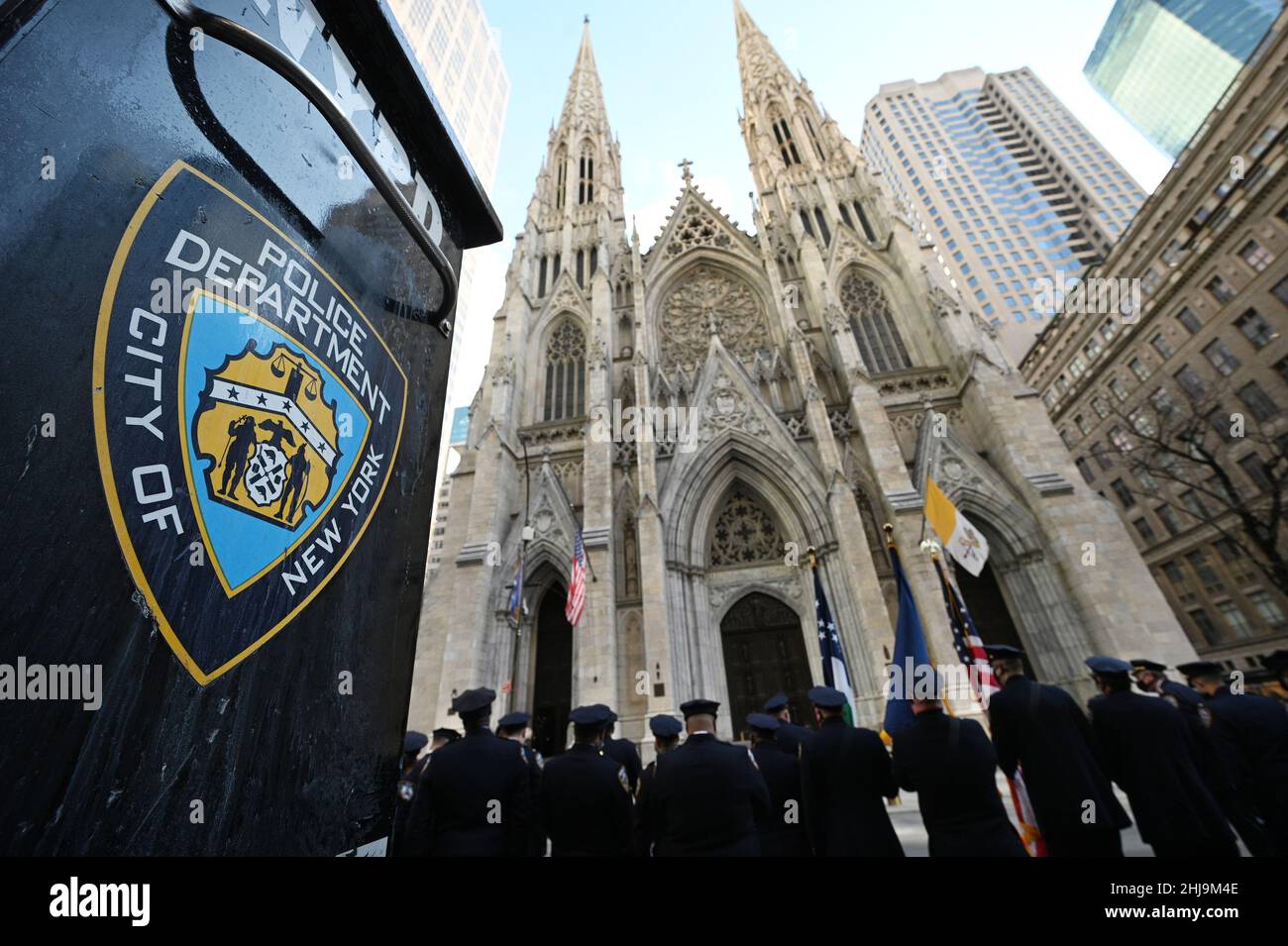 Members of the NYPD line up outside of St. Patrick’s Cathedral during ...