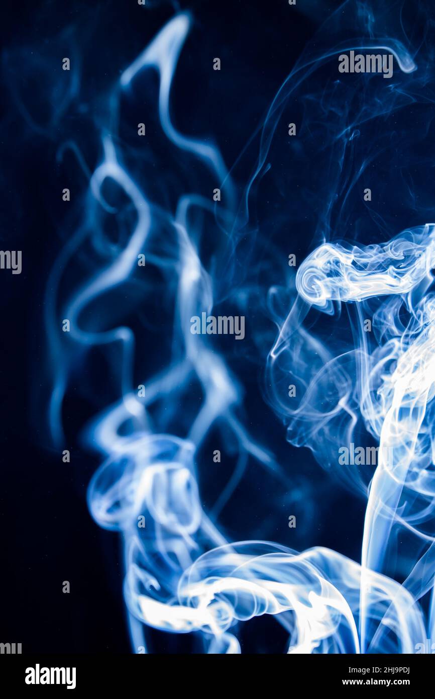 A closeup image of real blue smoke vapor texture Stock Photo - Alamy