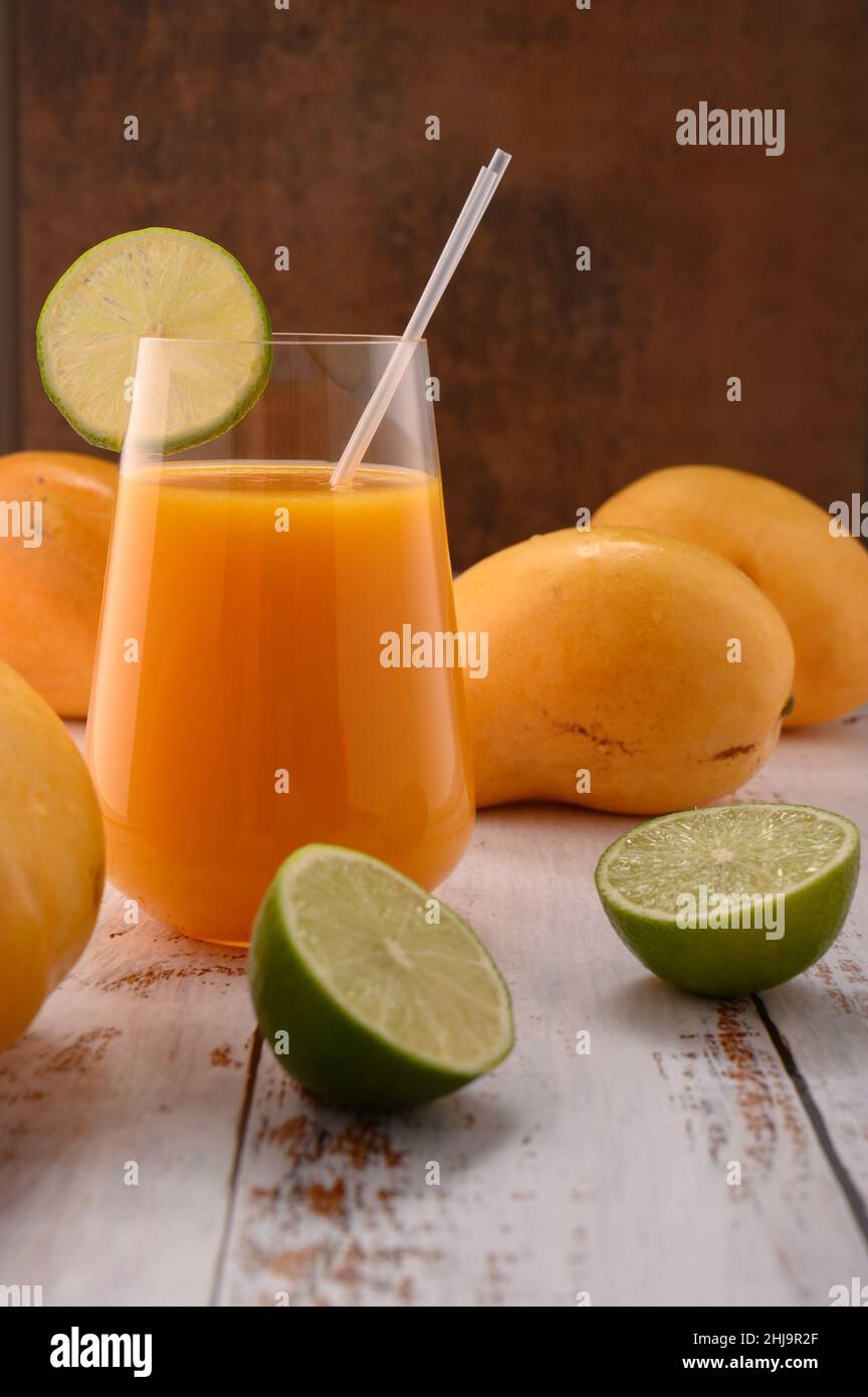 Photo shows glass transparent with natural fresh mandarine juice on ...
