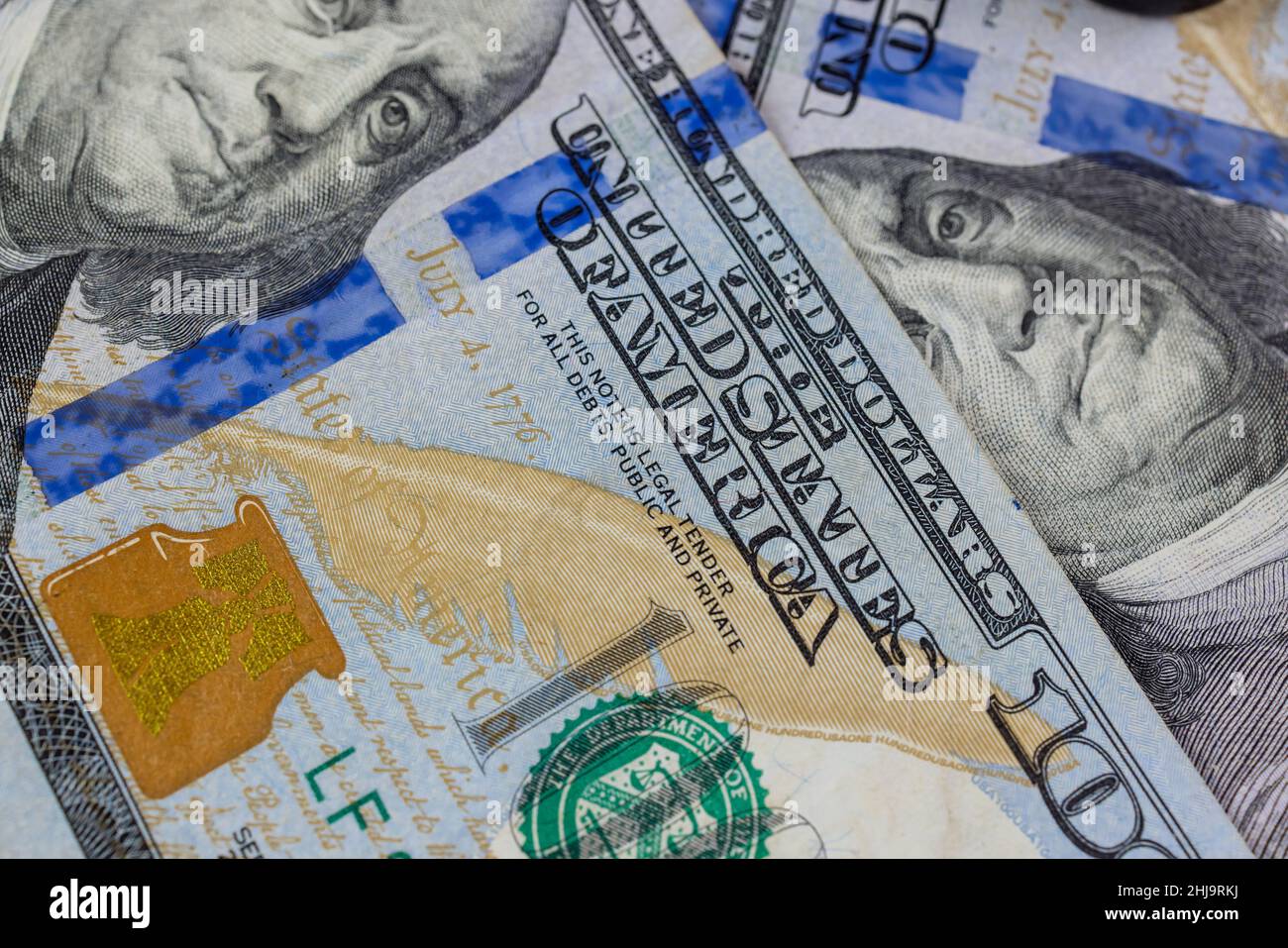 One hundred dollar paper bills of US money banknotes Stock Photo - Alamy