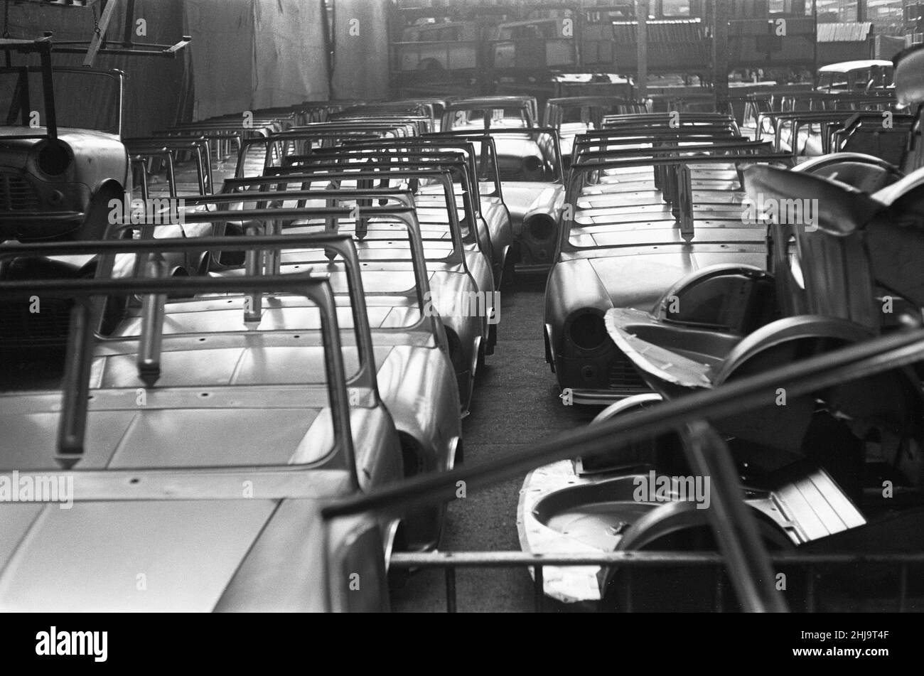Body shells for the Austin Mini await to go through the production line ...