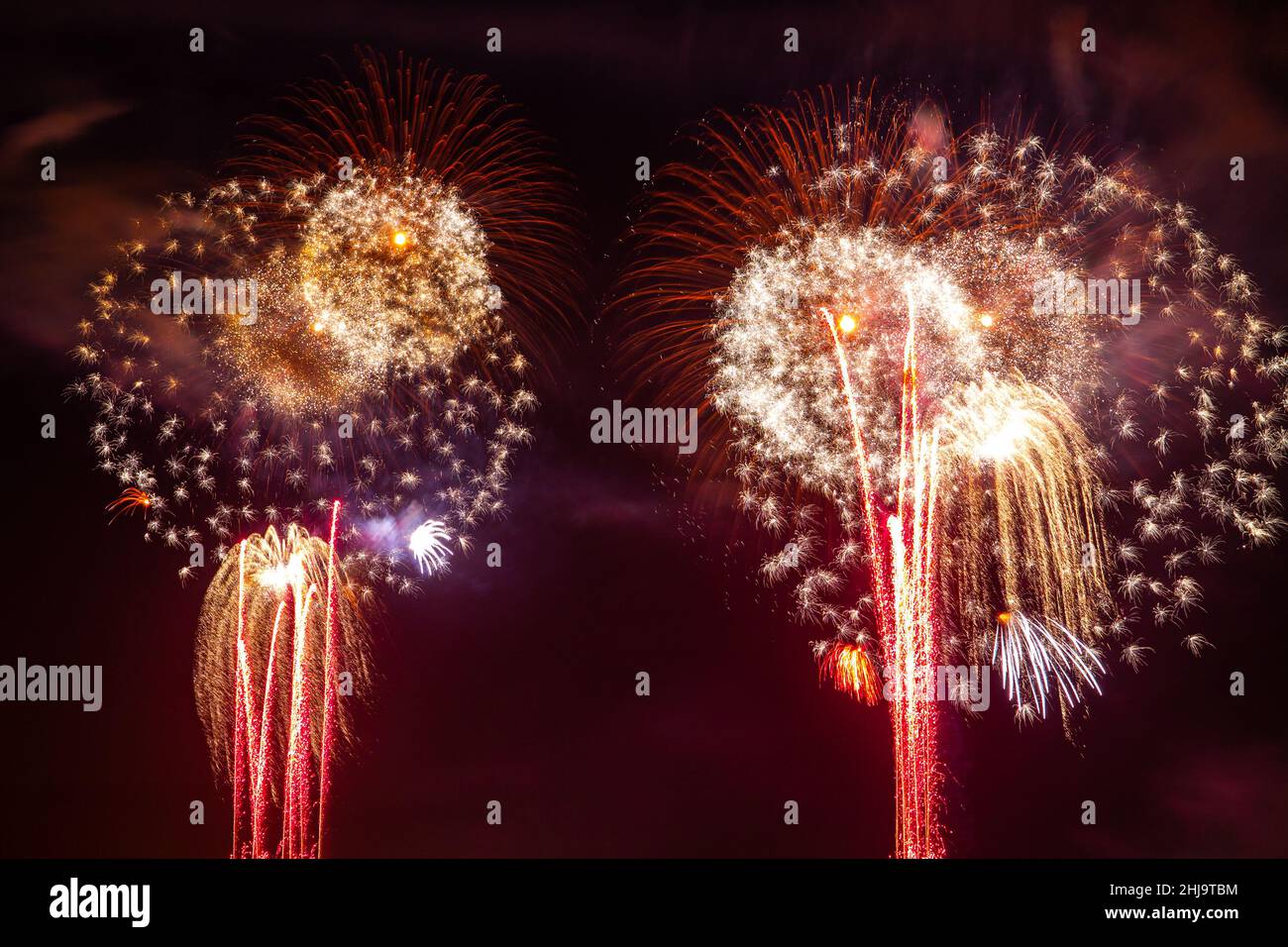 Colorful yellow and red fireworks 4th of July New Year's Eve ...