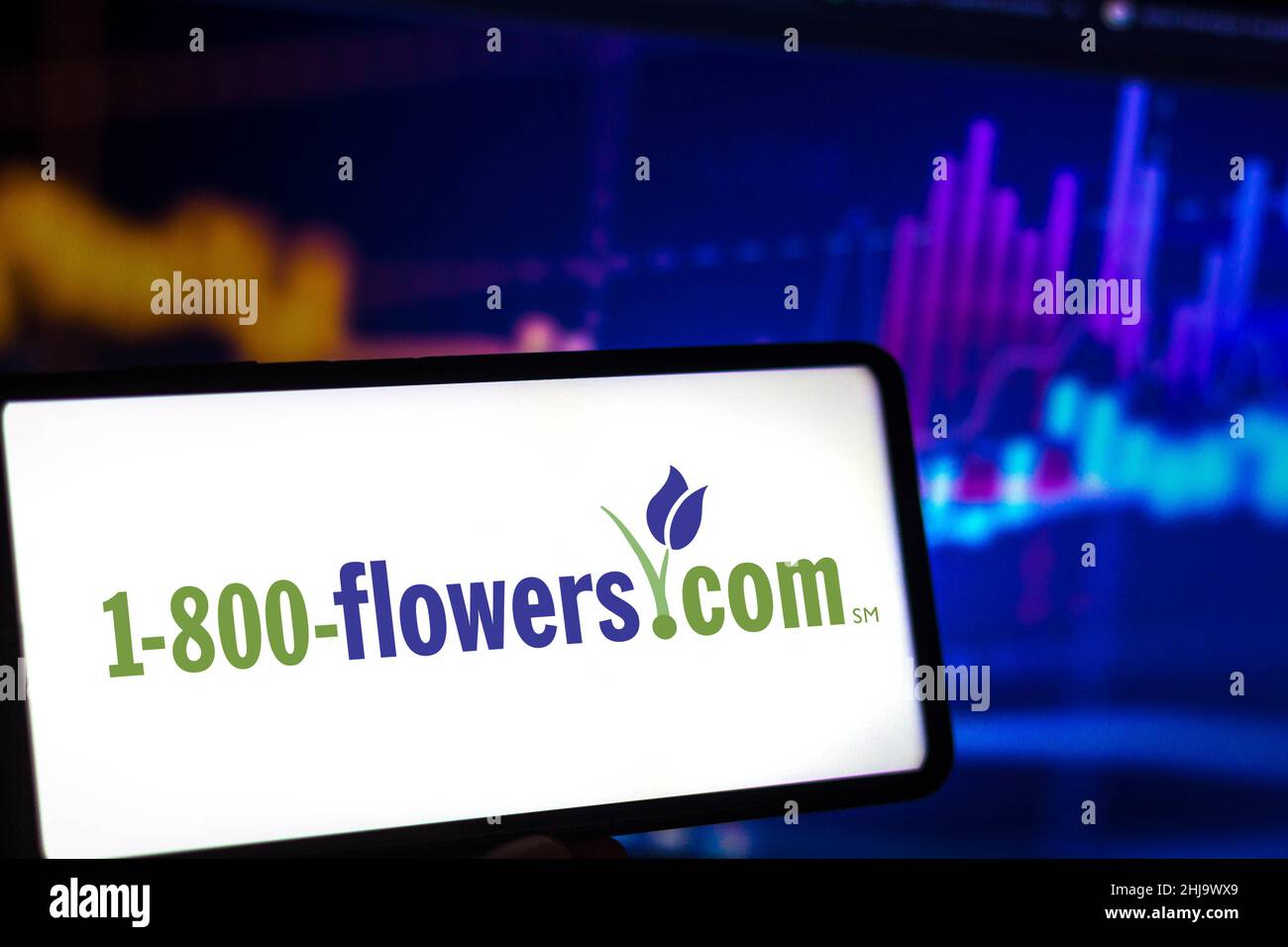 In this photo illustration, a 1-800-Flowers.com logo seen displayed on ...