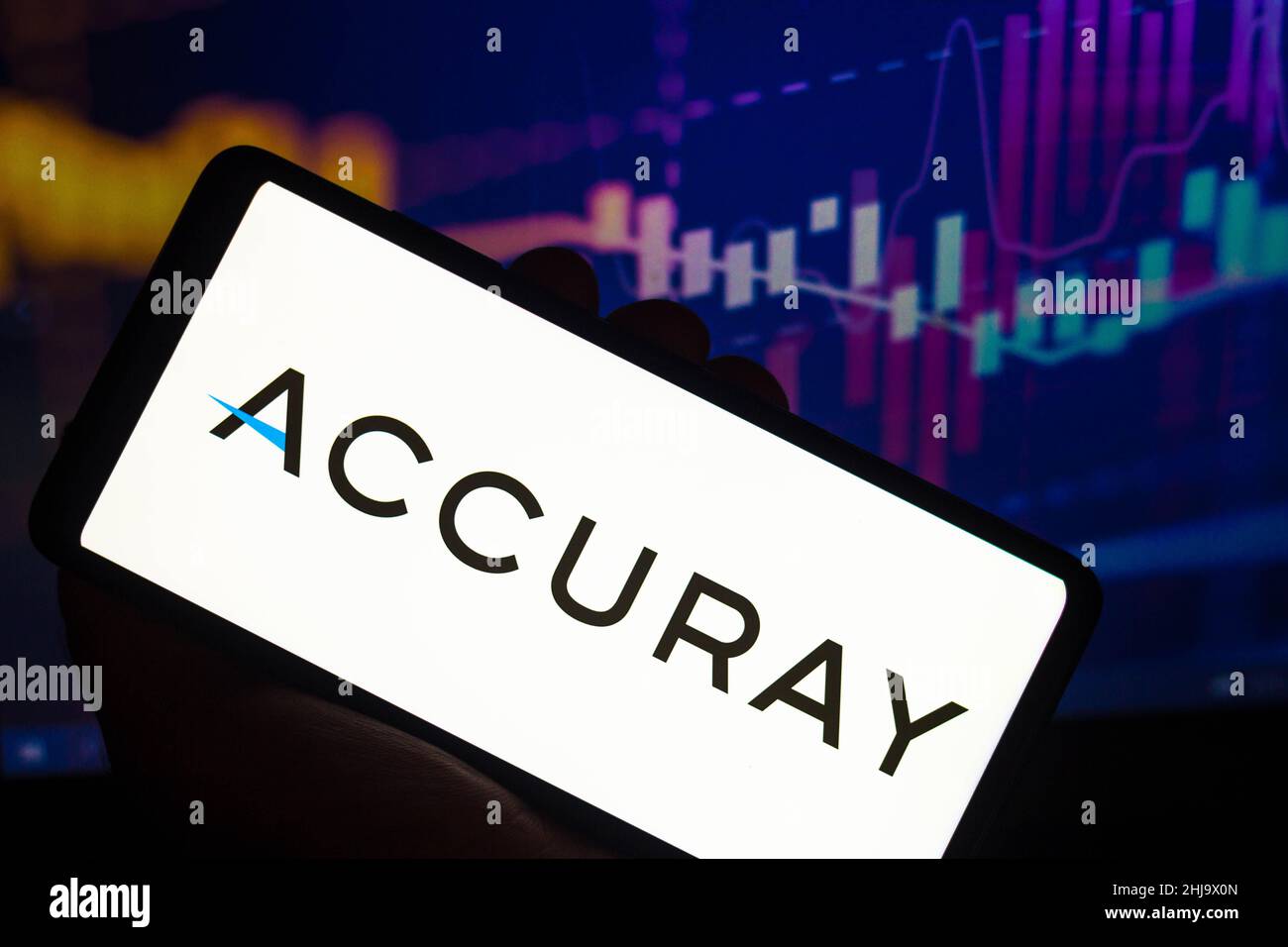 In this photo illustration, an Accuray Incorporated logo seen displayed ...