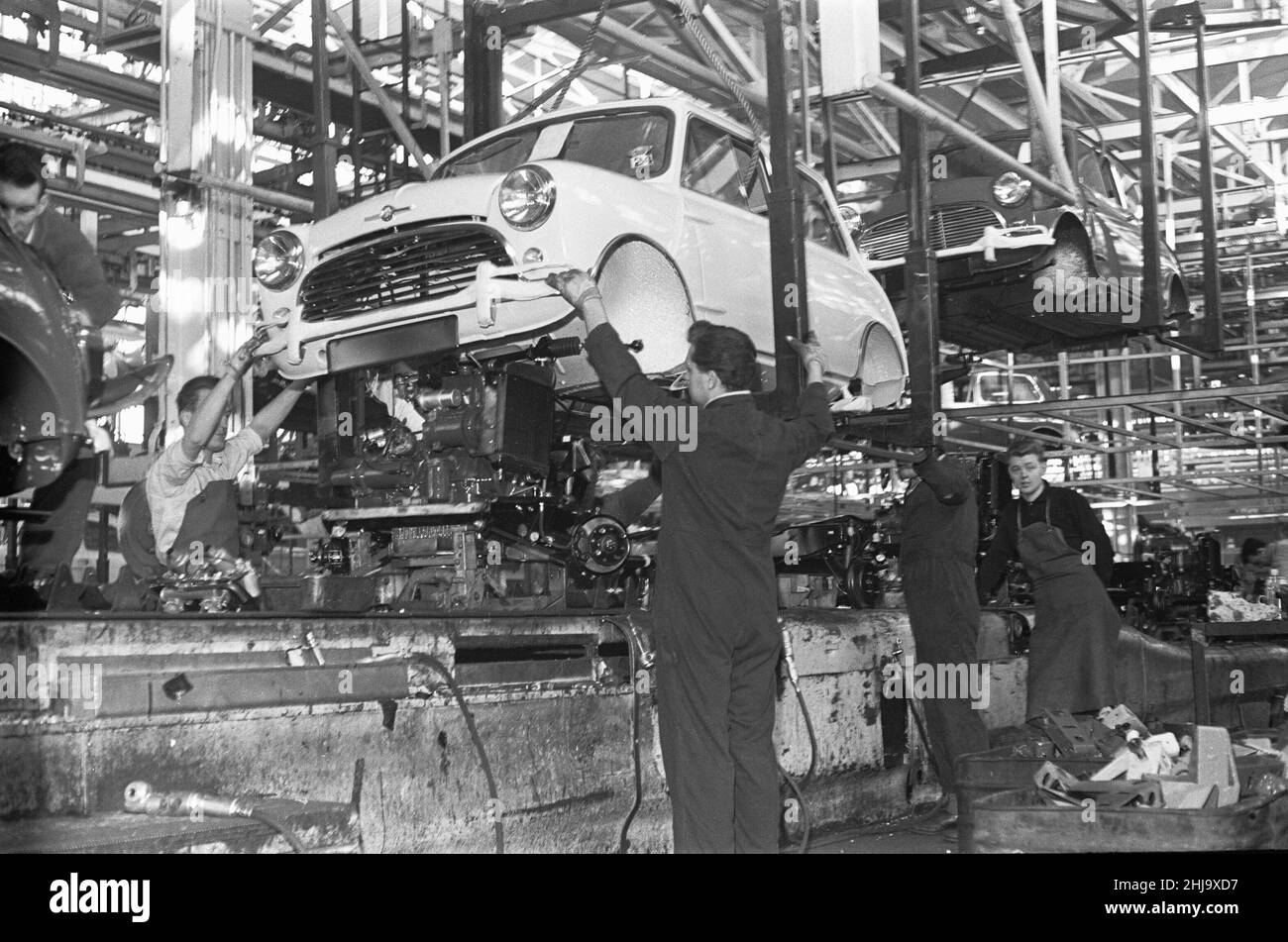 The engine is fitted to a Austin Mini on the production line ...