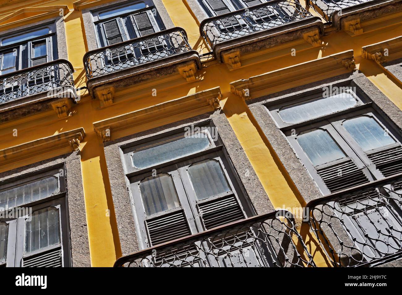 Yellow facade with balconies, downtown Rio Stock Photo - Alamy