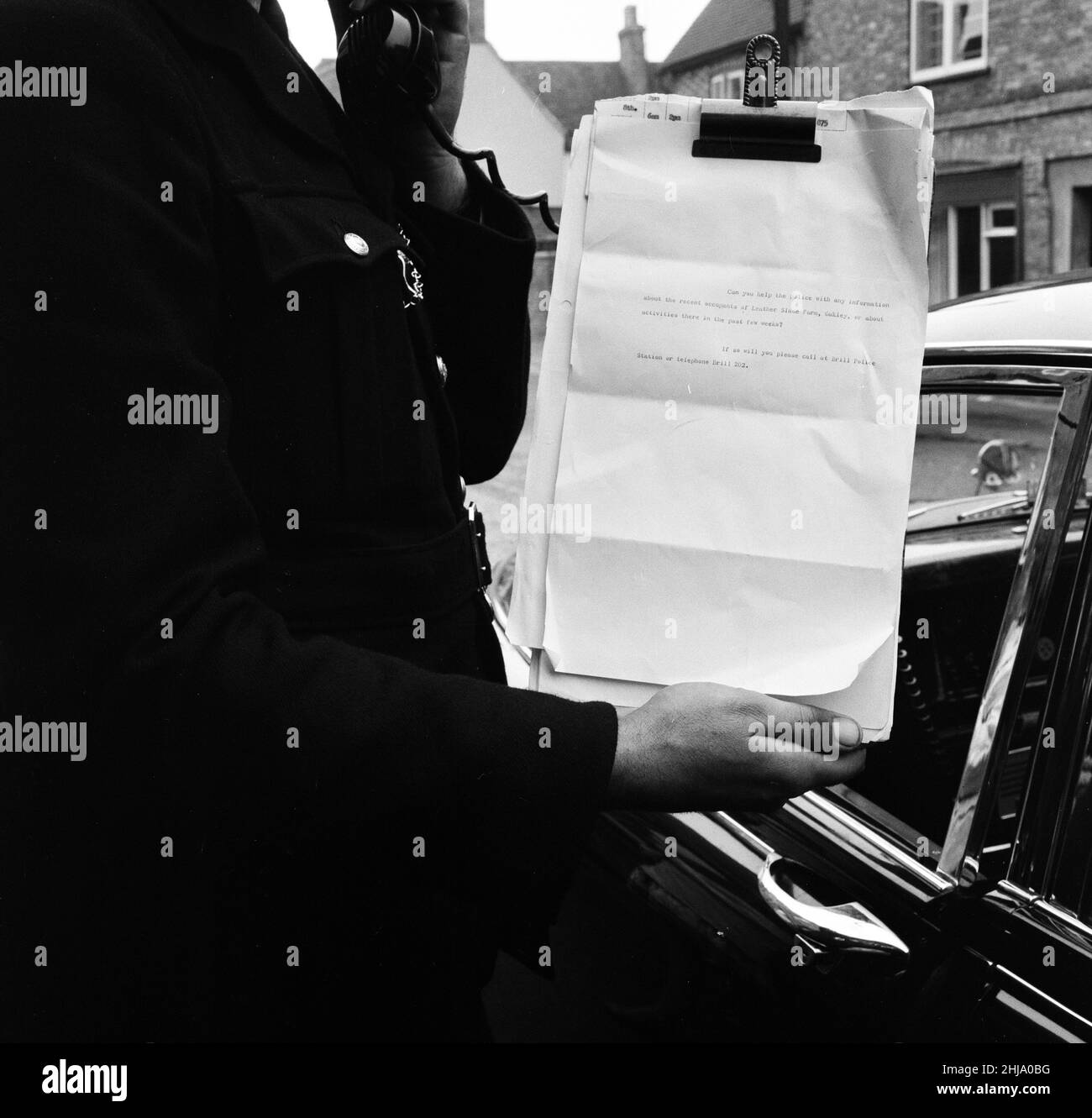 Police car equipped with a telephone loudspeaker unit, appeals for ...