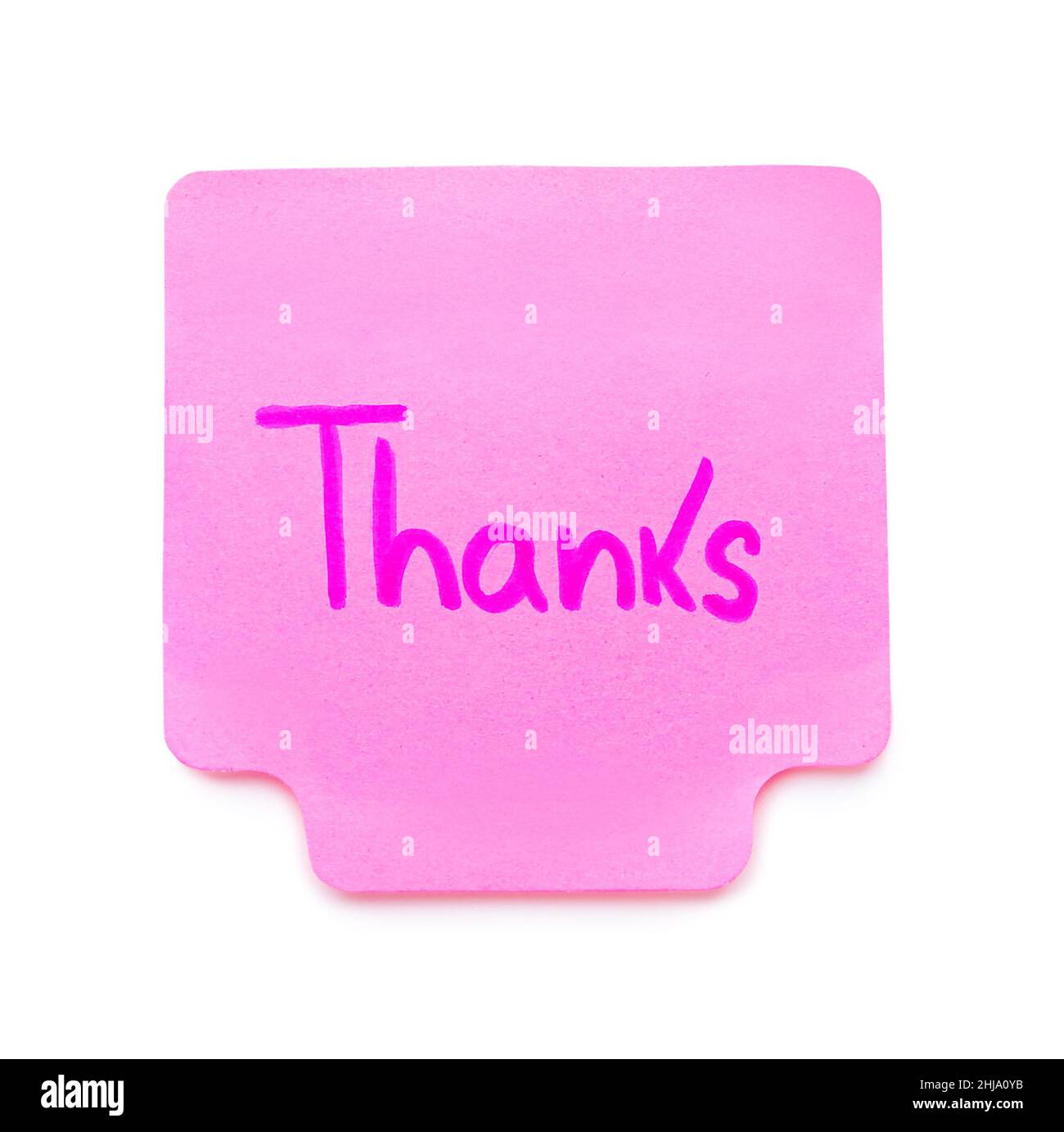 Pink sticky note with word THANKS on white background Stock Photo - Alamy