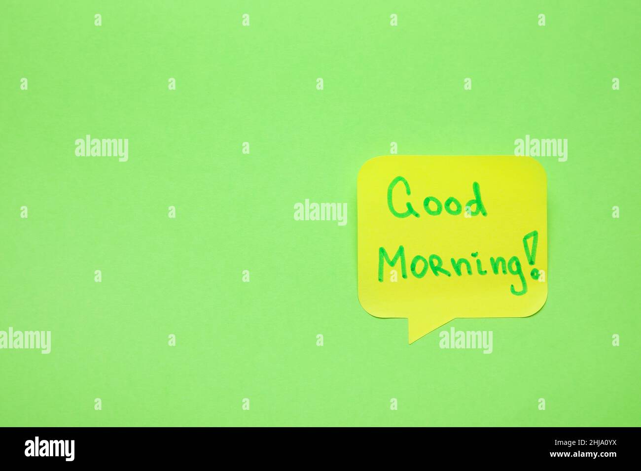 Sticky note with text GOOD MORNING on green background Stock Photo - Alamy