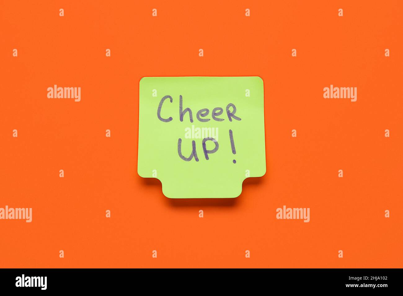 Sticky note with text CHEER UP on red background Stock Photo - Alamy