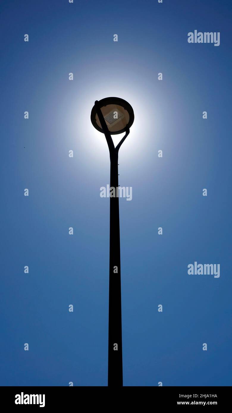 Light pole and sun light Stock Photo - Alamy