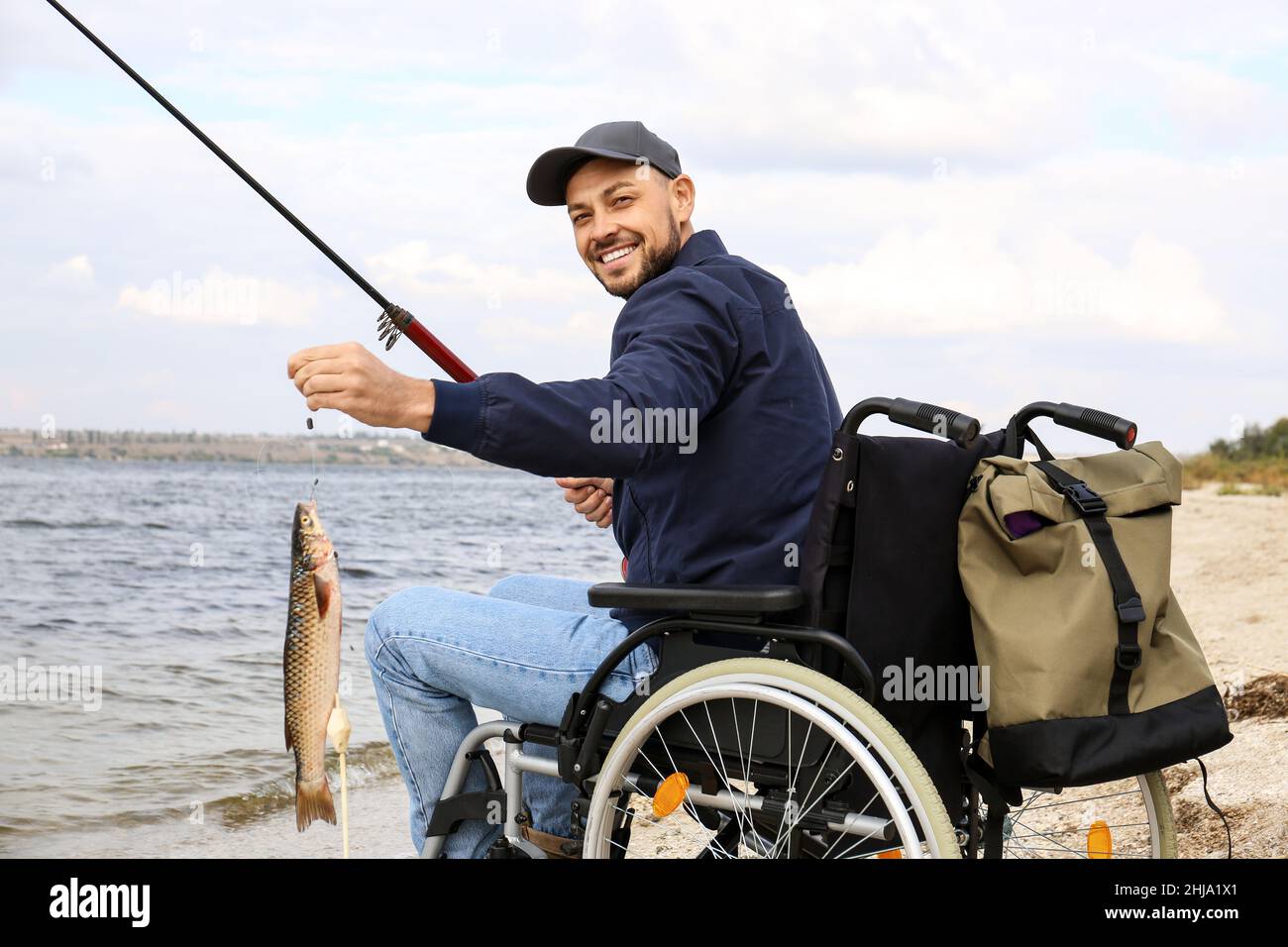 Wheelchair fishing hi-res stock photography and images - Alamy