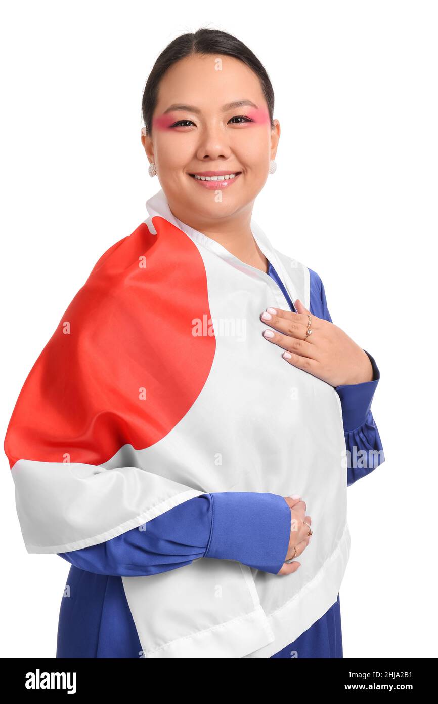 Beautiful young Asian woman with flag of Japan on white background ...