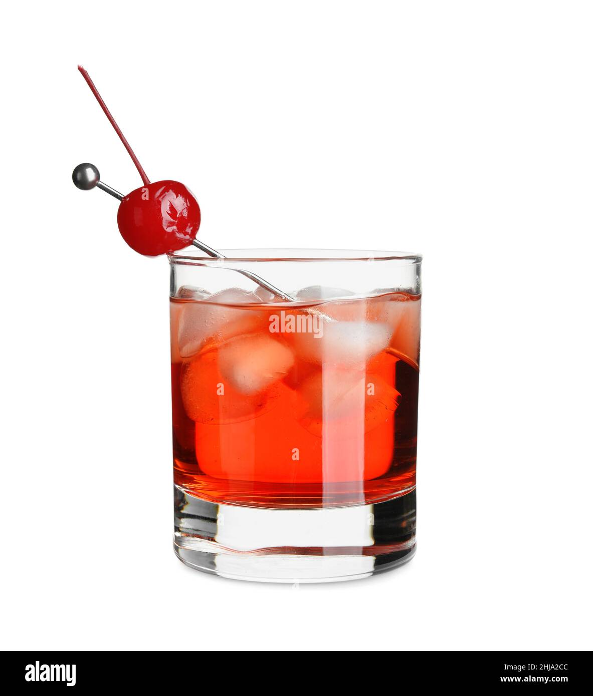 Glass of Manhattan cocktail with cherry and ice on white background ...