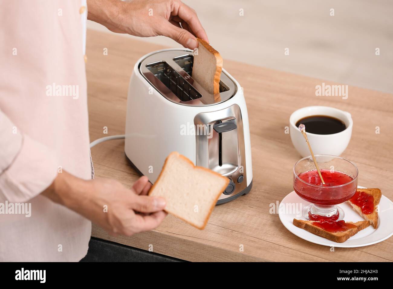 Closeup man preparing tea hi-res stock photography and images - Alamy