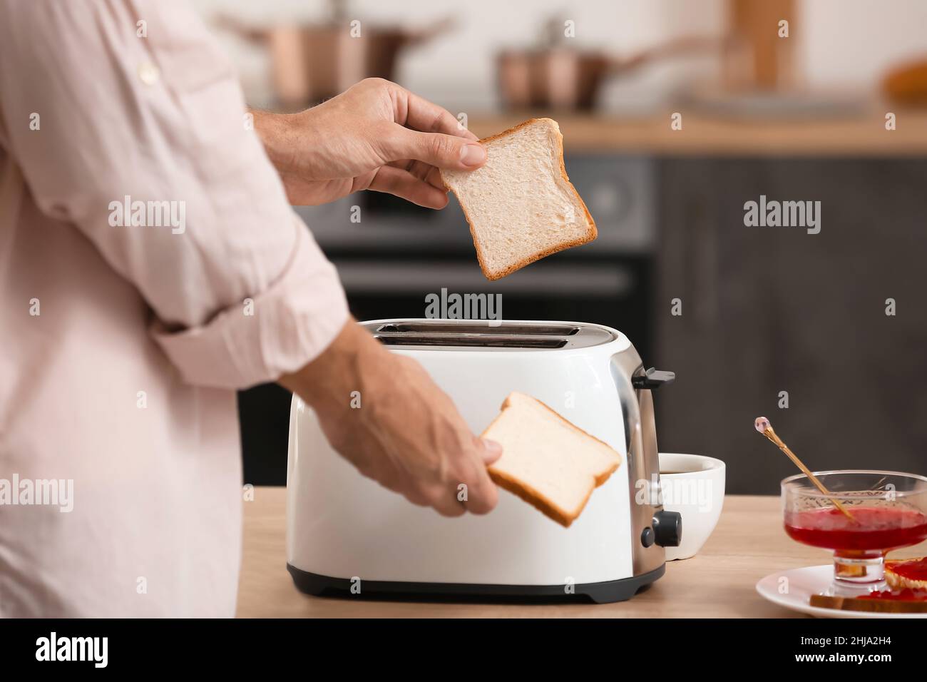 Closeup man preparing tea hi-res stock photography and images - Alamy