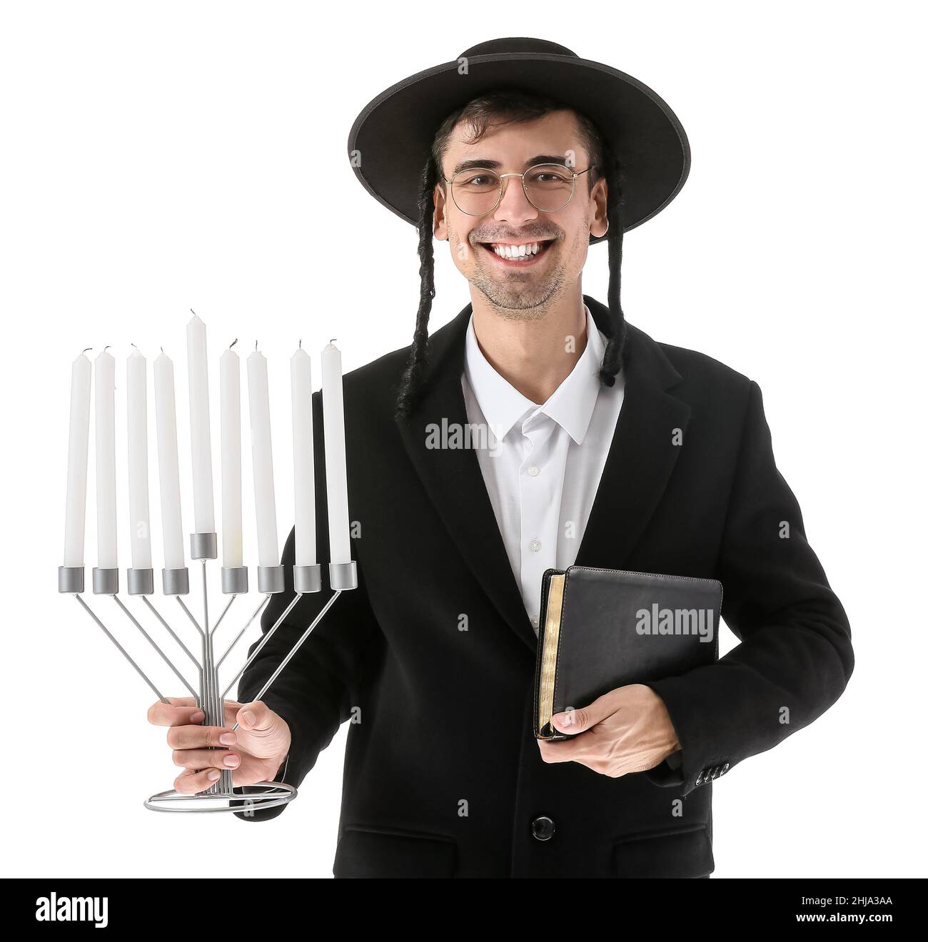Jewish man with Torah and menorah on white background Stock Photo - Alamy