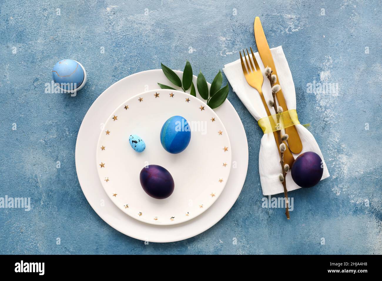 Stylish table setting for Easter celebration on grunge background Stock ...