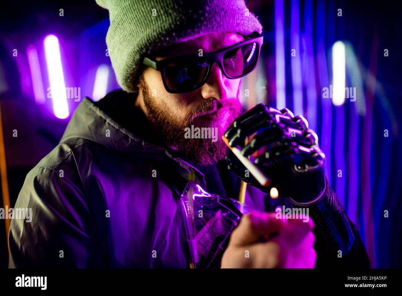 cyber robot hand close up of male handle use lighters going to smoking ...