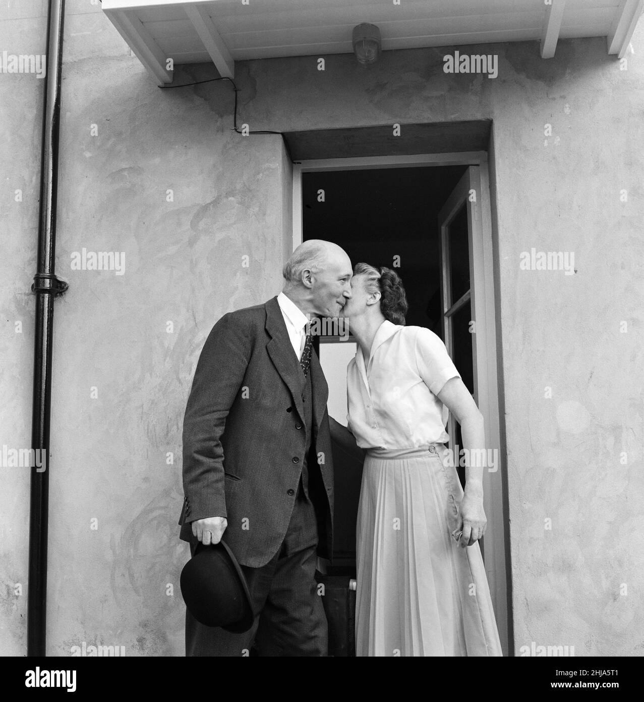 Lord Denning kisses his wife at their home in Whitchurch before leaving ...