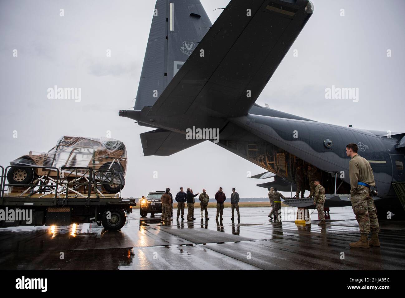 U.S. Air Force Airmen with the 347th Rescue Group load a Side by ...