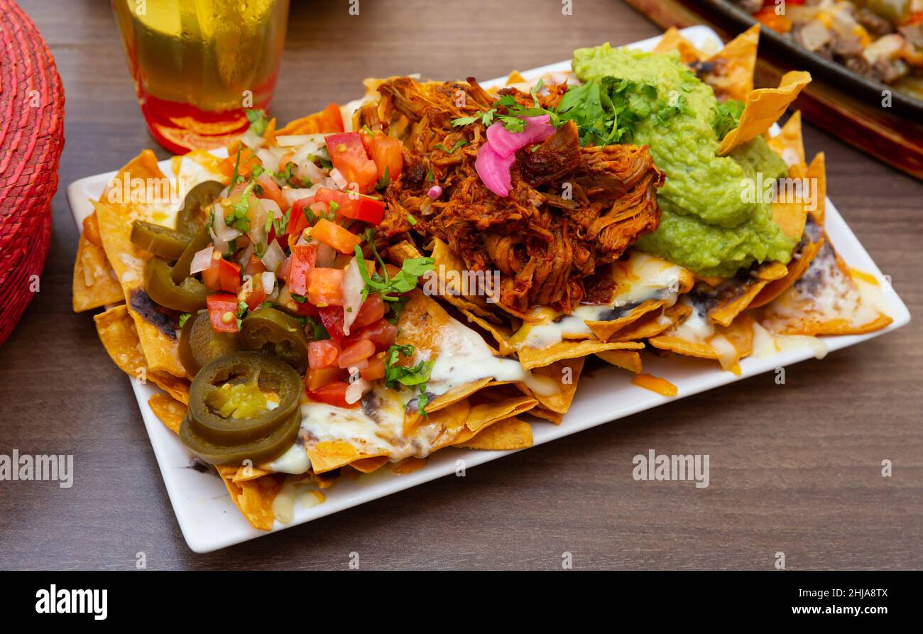 Traditional Mexican dish Nachos Stock Photo - Alamy