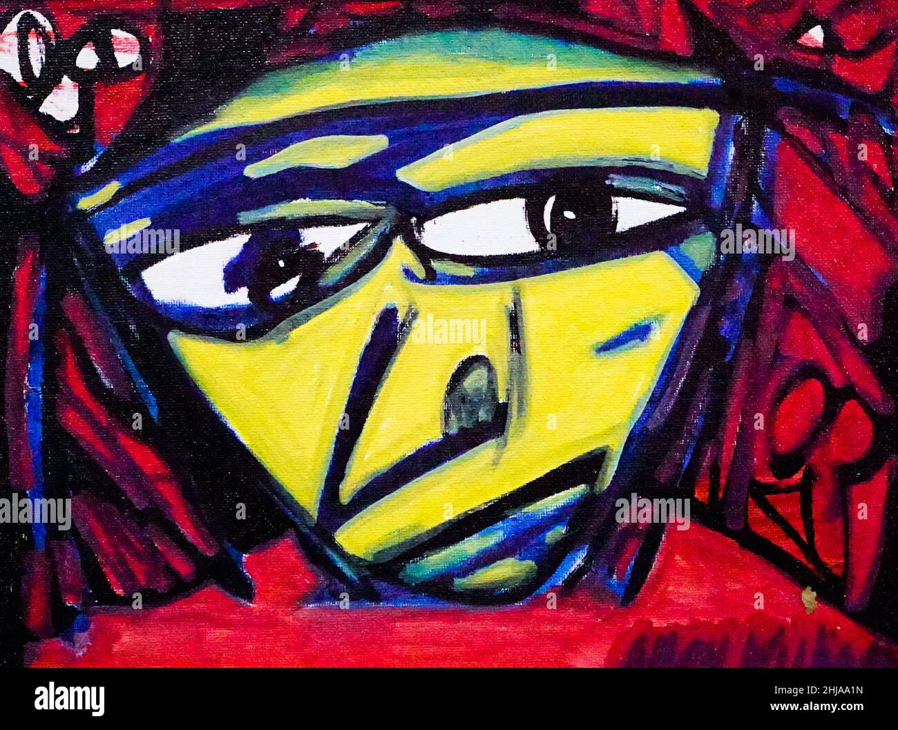 yellow face red background Stock Photo - Alamy