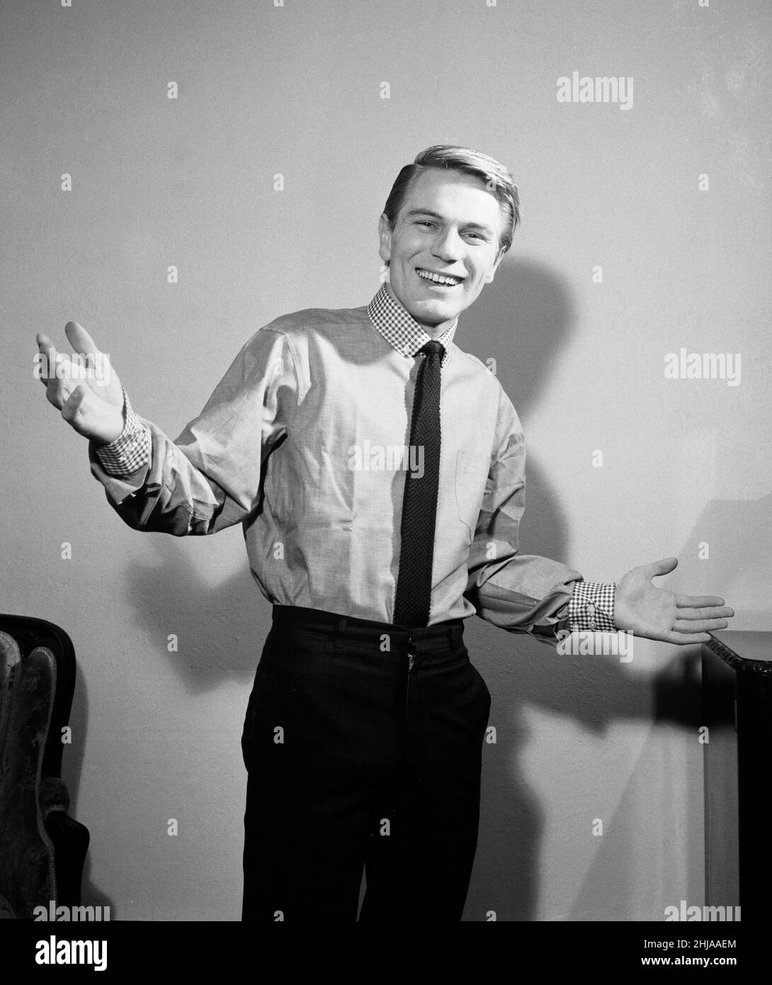 Adam Faith modelling a Canary Yellow pullover and Suede jacket. 13th ...