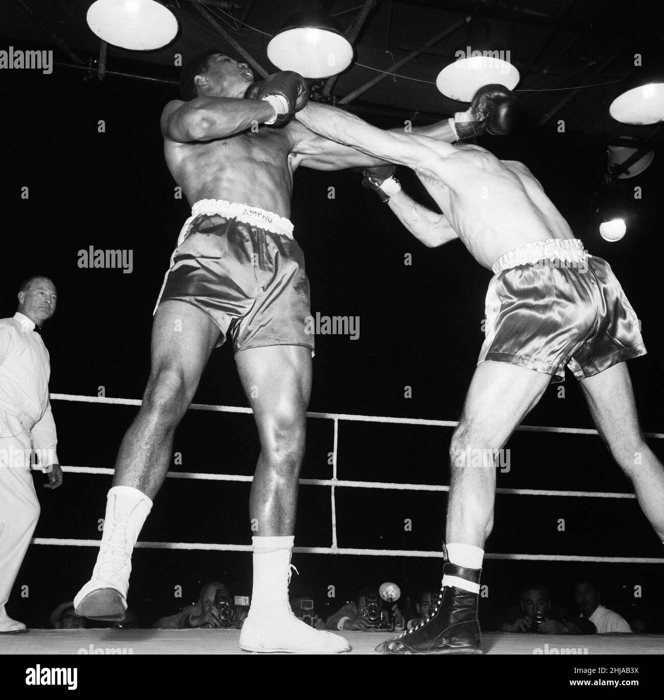 Action during the non-title heavyweight fight between American Cassius ...
