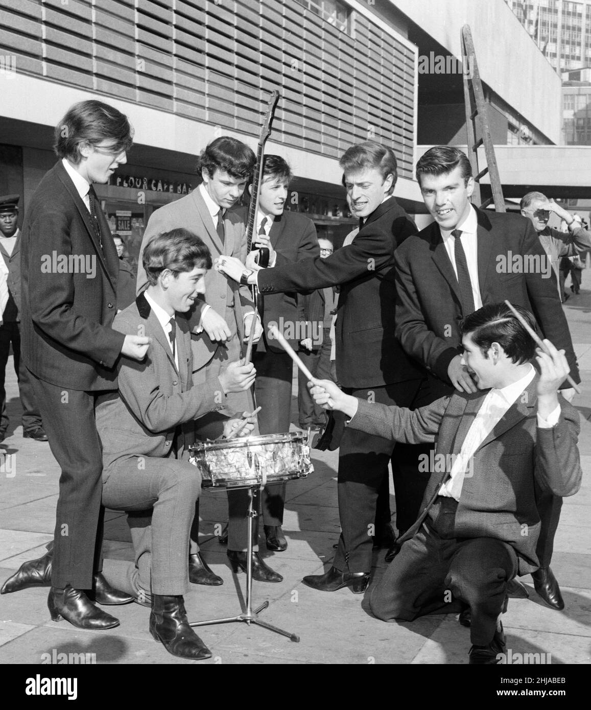 Pictue show two different pop groups both named 'The Fortunes' meeting ...