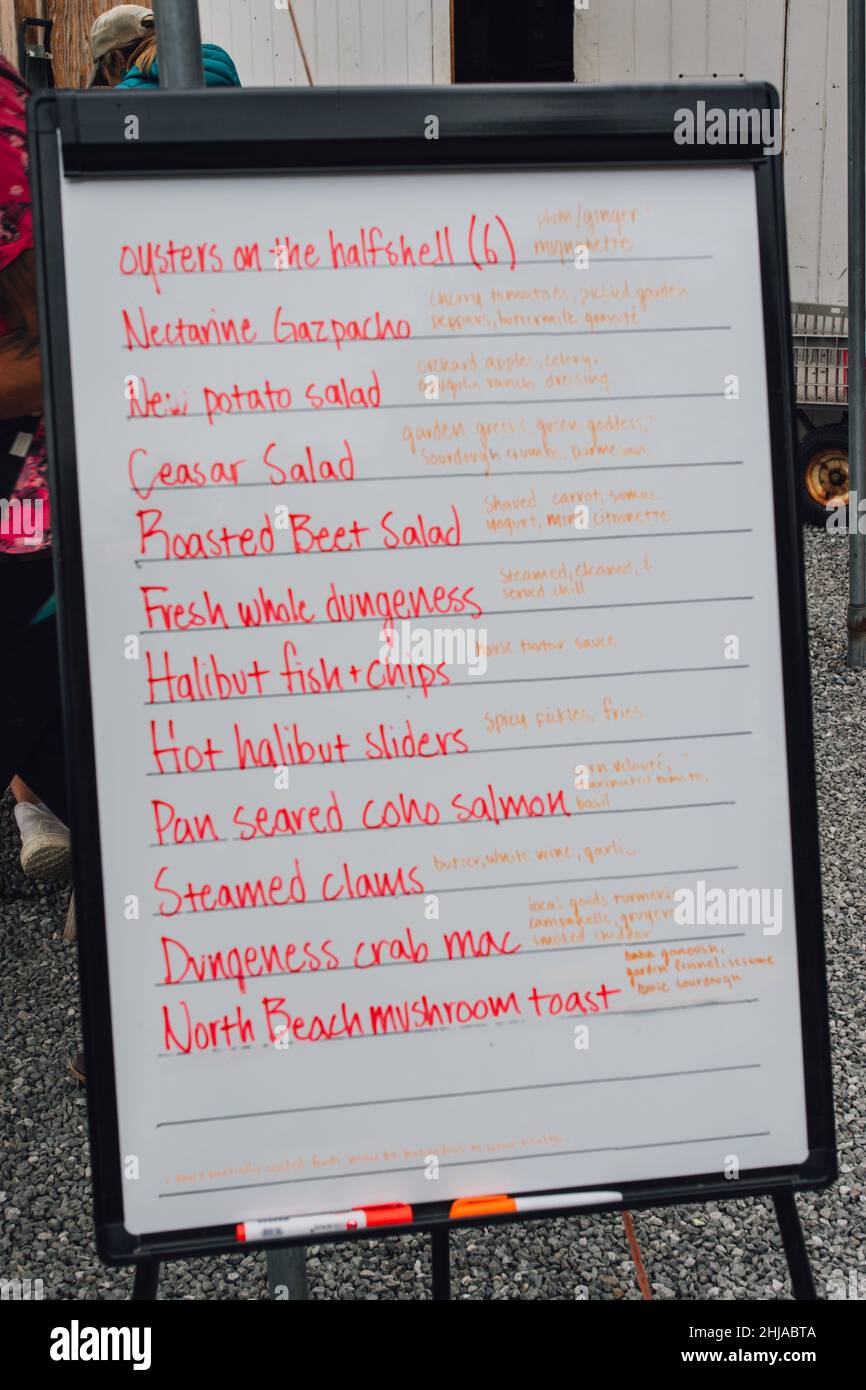 white board menu at outdoor seafood restaurant Stock Photo - Alamy