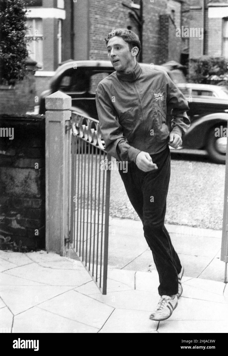 Athlete Ron Hill runs home from work, which is five miles away and ...