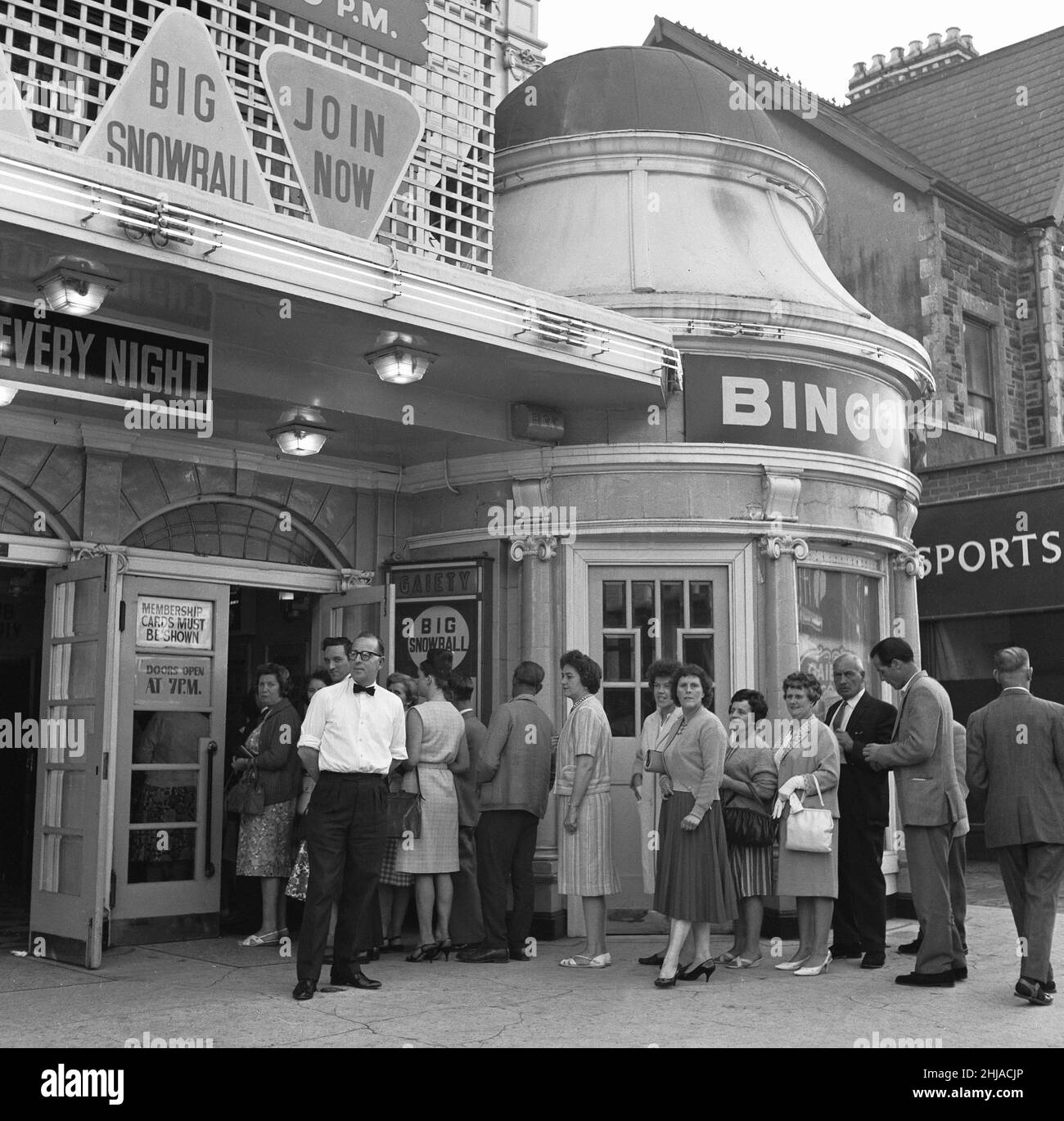 People queue outside the Gaiety Theatre, to play bingo. 31st July 1963 ...