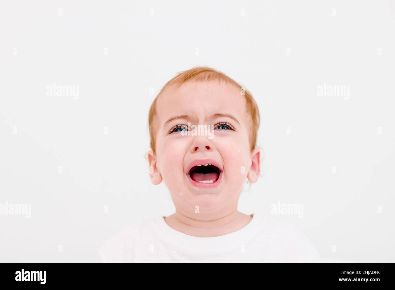 Portrait baby 1 years old open mouth with milk teeth on white ...