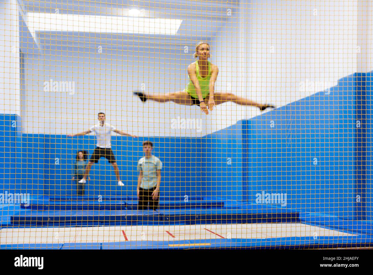 Aerial jumping young woman hi-res stock photography and images - Alamy