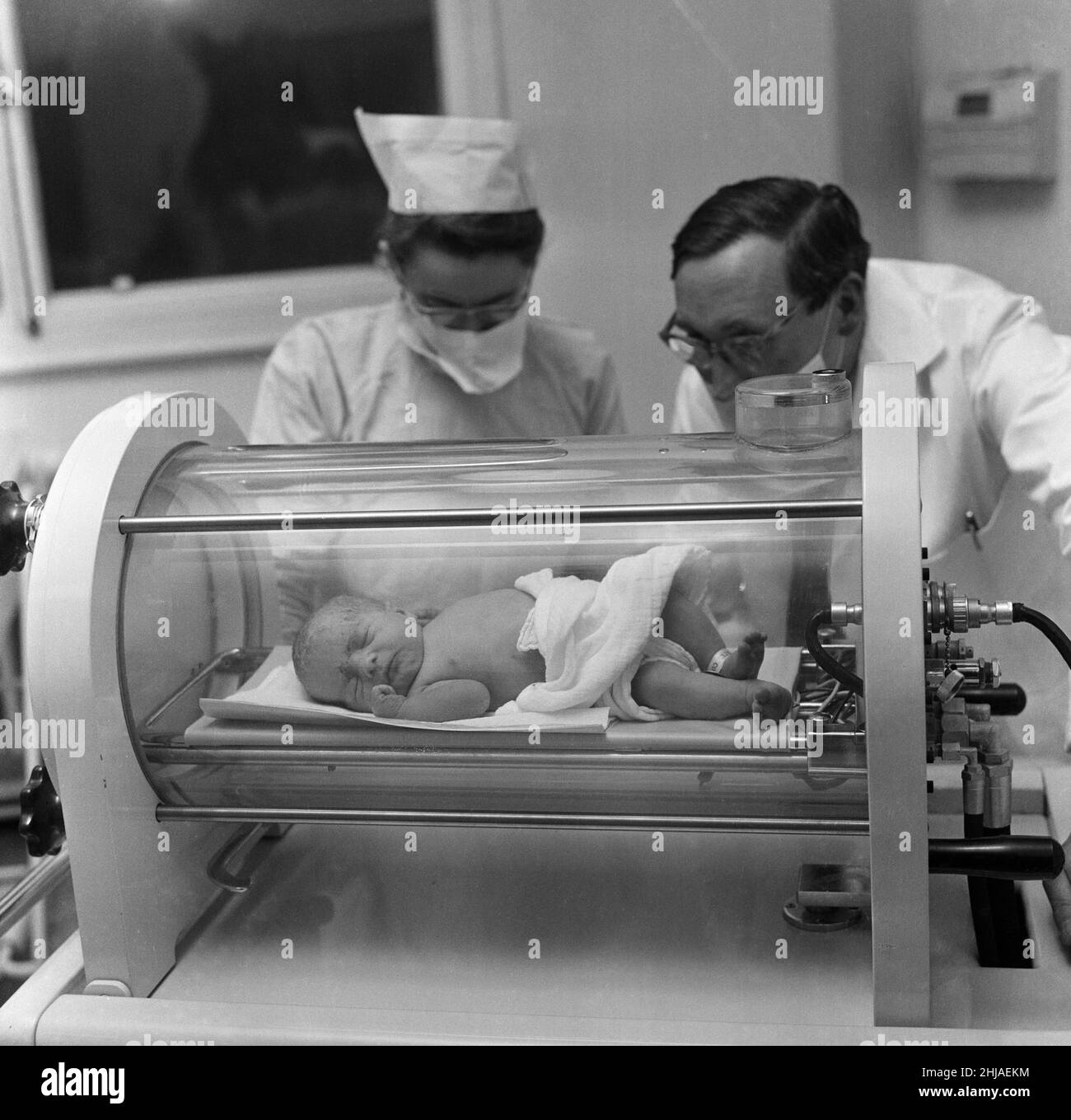 A premature baby in one of the machines that can save new born babies ...