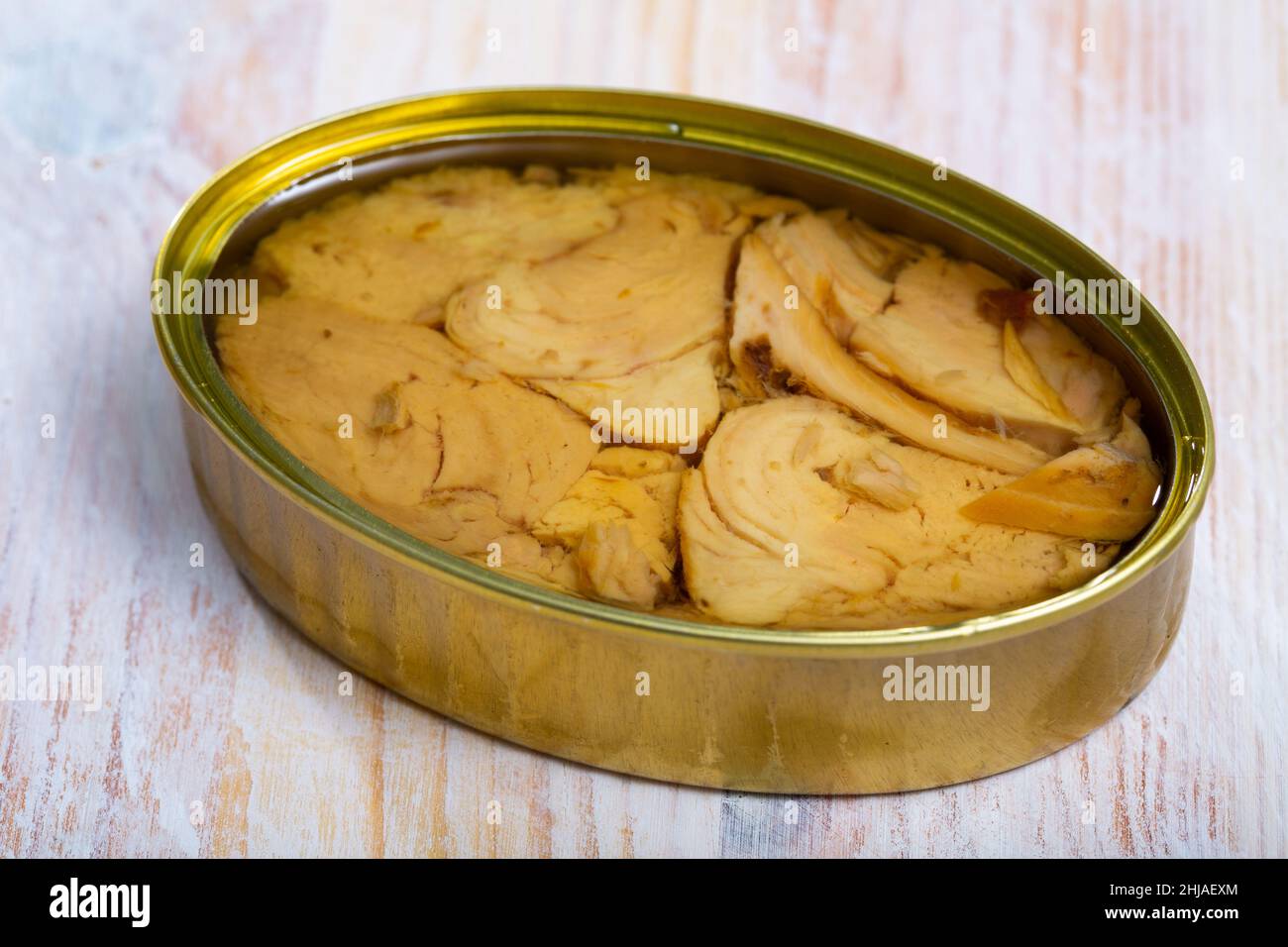 Open tin can of tuna in oil Stock Photo - Alamy