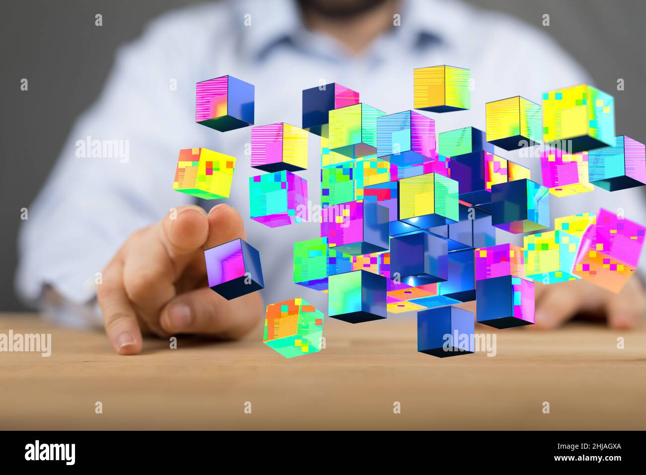Person presenting a 3D render of digital cubes Stock Photo - Alamy