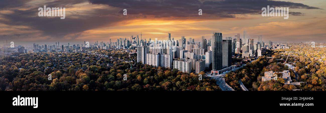Drone Panorama of Toronto skyline with trees surrounding the cityscape ...