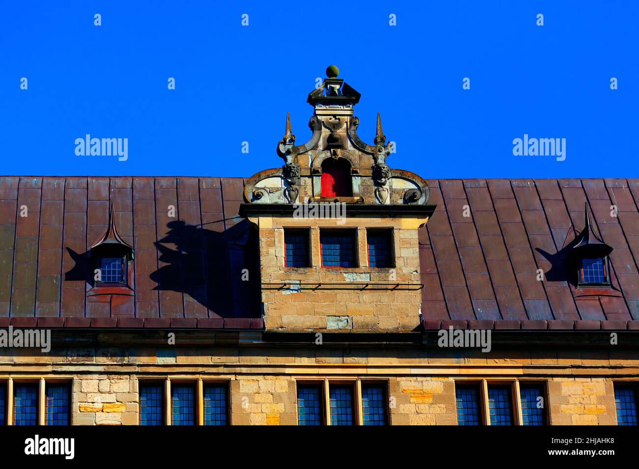 Medieval attic and tiled roof . Old rooftop with ornate attic Stock ...