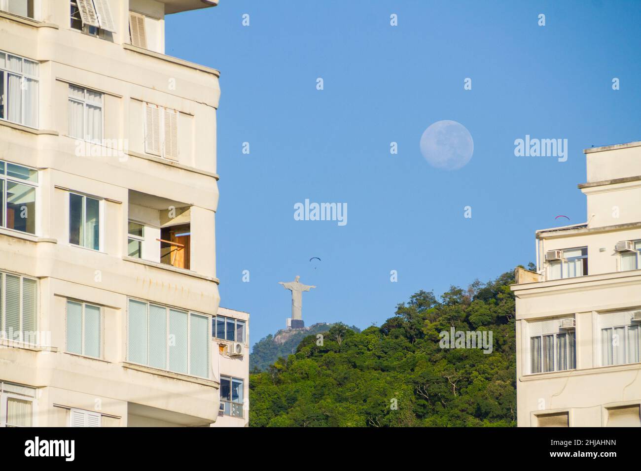 Christ the Redeemer and the Moon seen from Copacabana in Rio de Janeiro ...