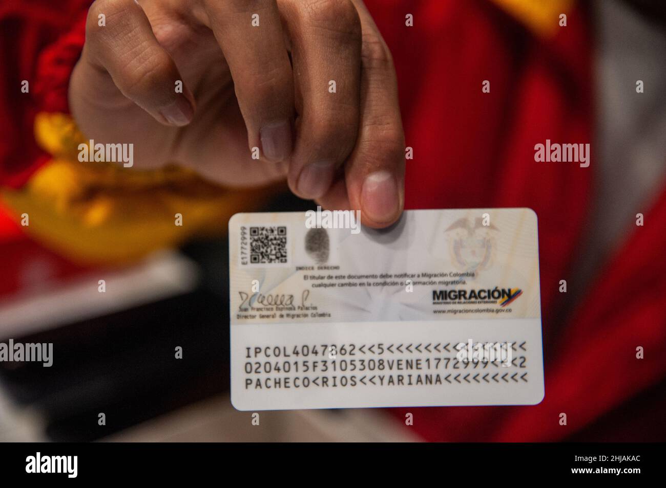 Bogota, Colombia. 27th Jan, 2022. A Colombian migration officer ...